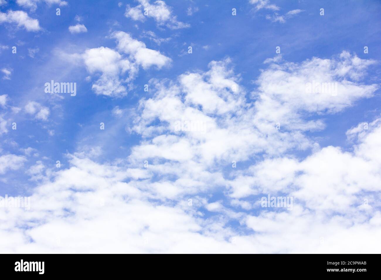 Clear blue color sky with white cloud background Stock Photo - Alamy