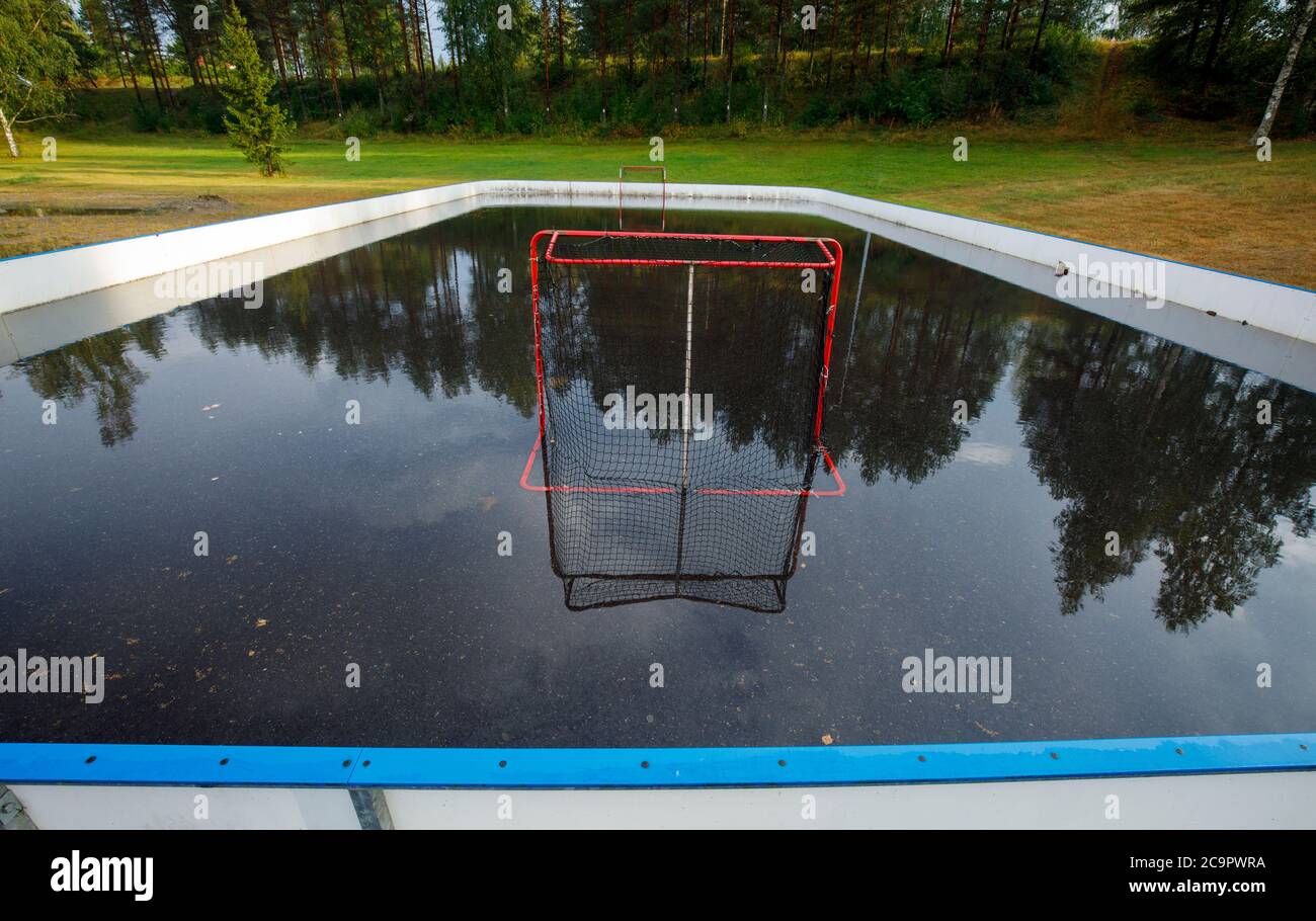 Floorball goal at water-filled outdoor floorball court , Finland Stock ...