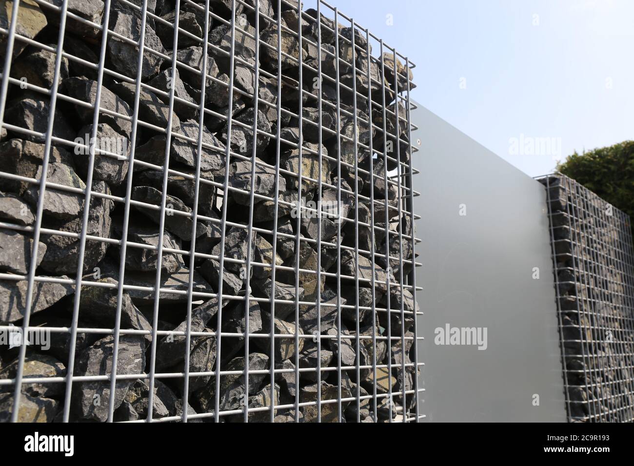 Gabion fence wall Stock Photo - Alamy
