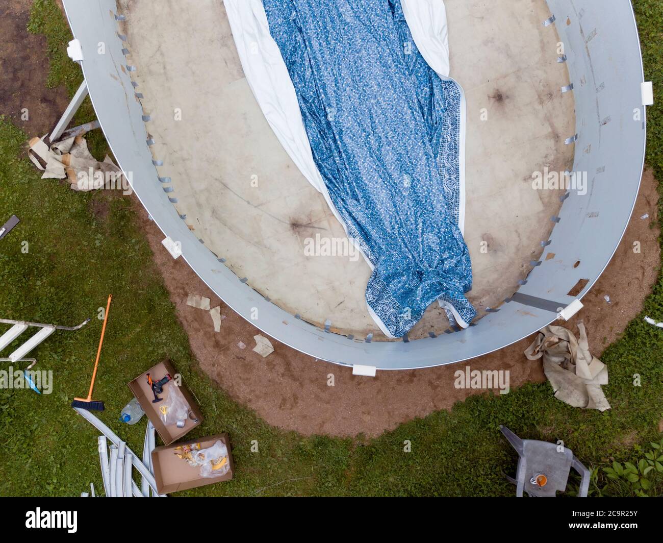 Aerial view of maintaing above ground swimming pool Stock Photo - Alamy