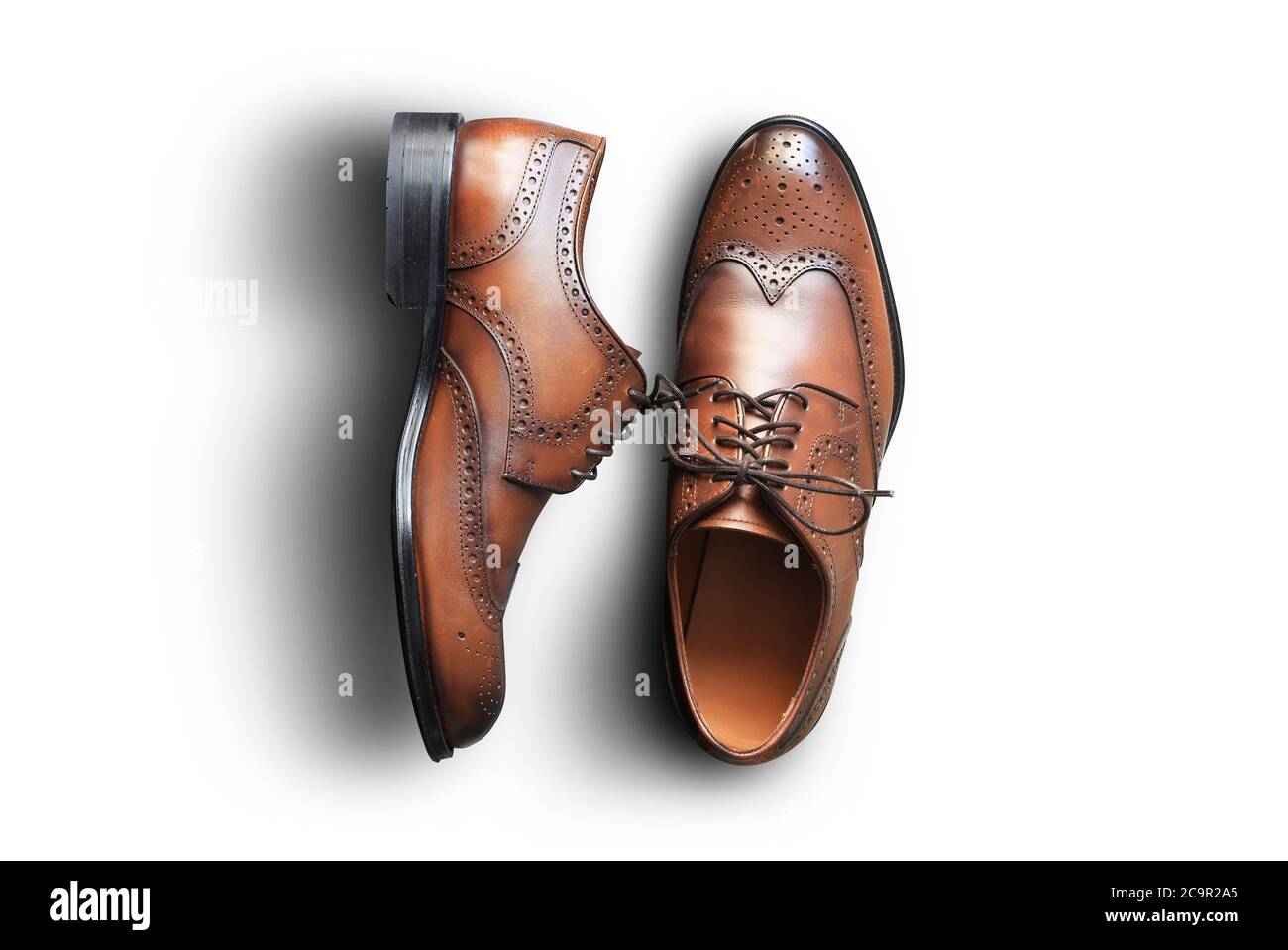 Brown leather men's shoes in classic style Stock Photo - Alamy
