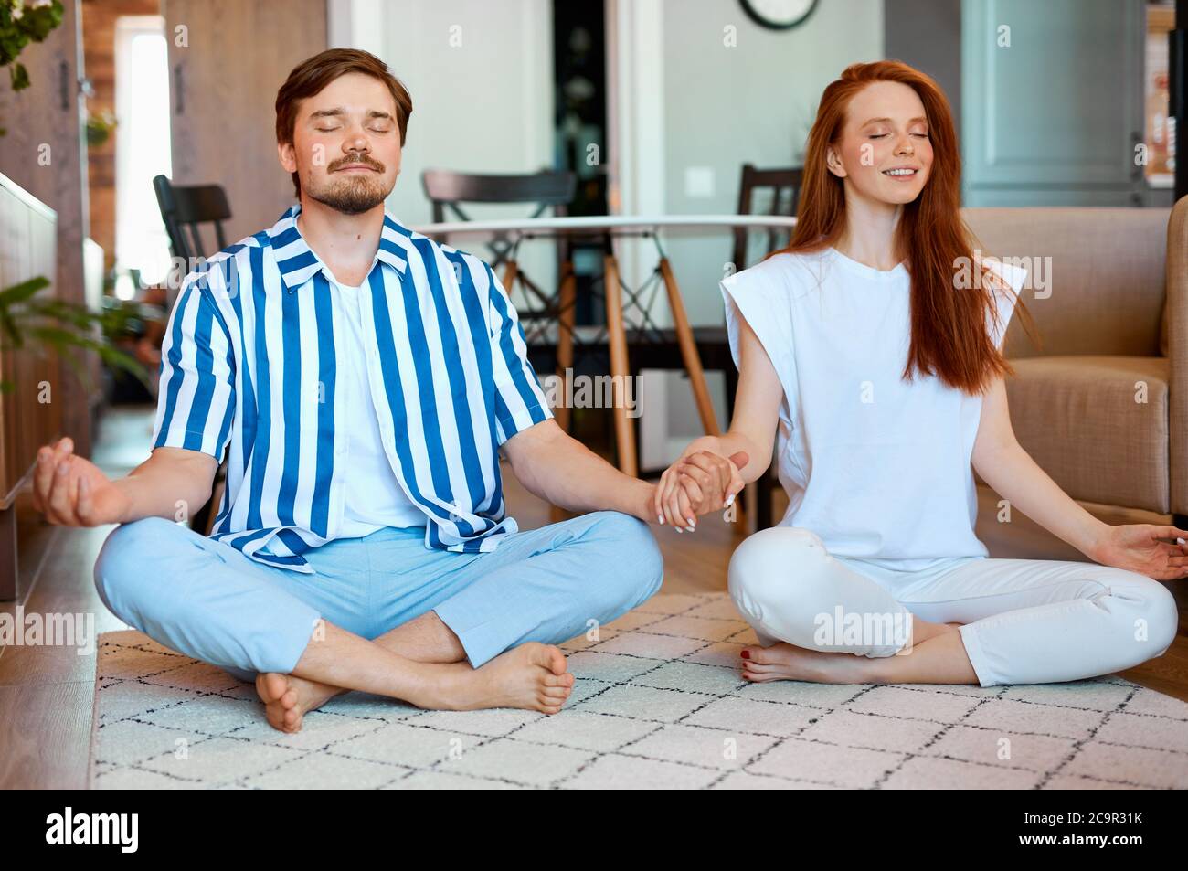 Young couple practice stretching together hi-res stock photography and ...
