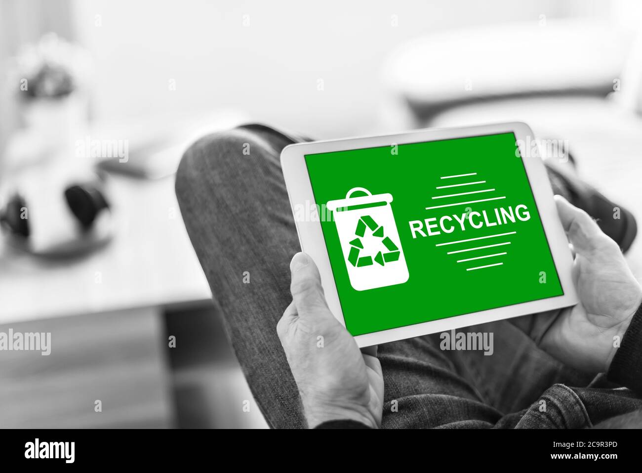 Tablet screen displaying a recycling concept Stock Photo - Alamy