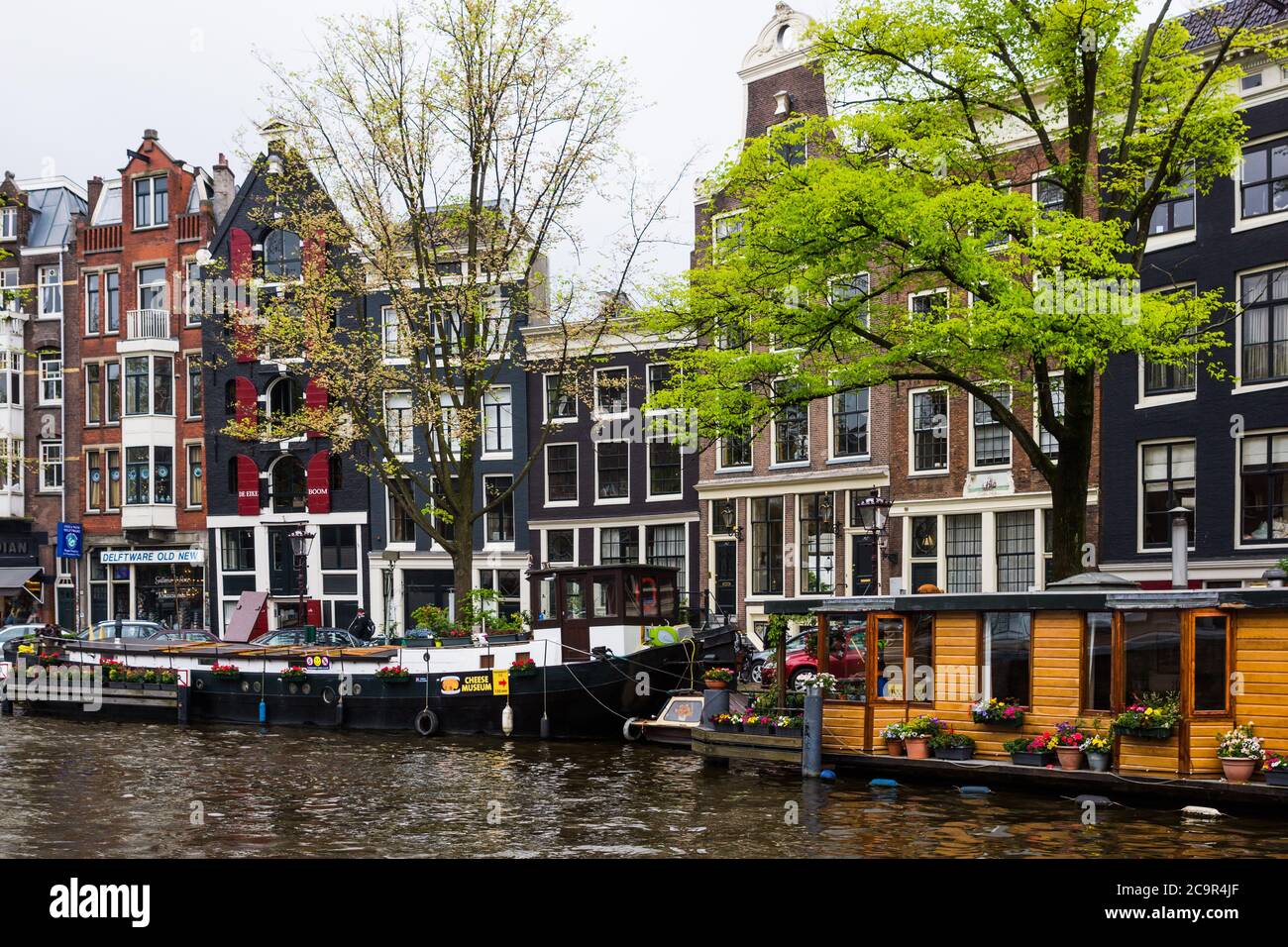 Facades of the narrow canal houses of Amsterdam, The Netherlands with ...