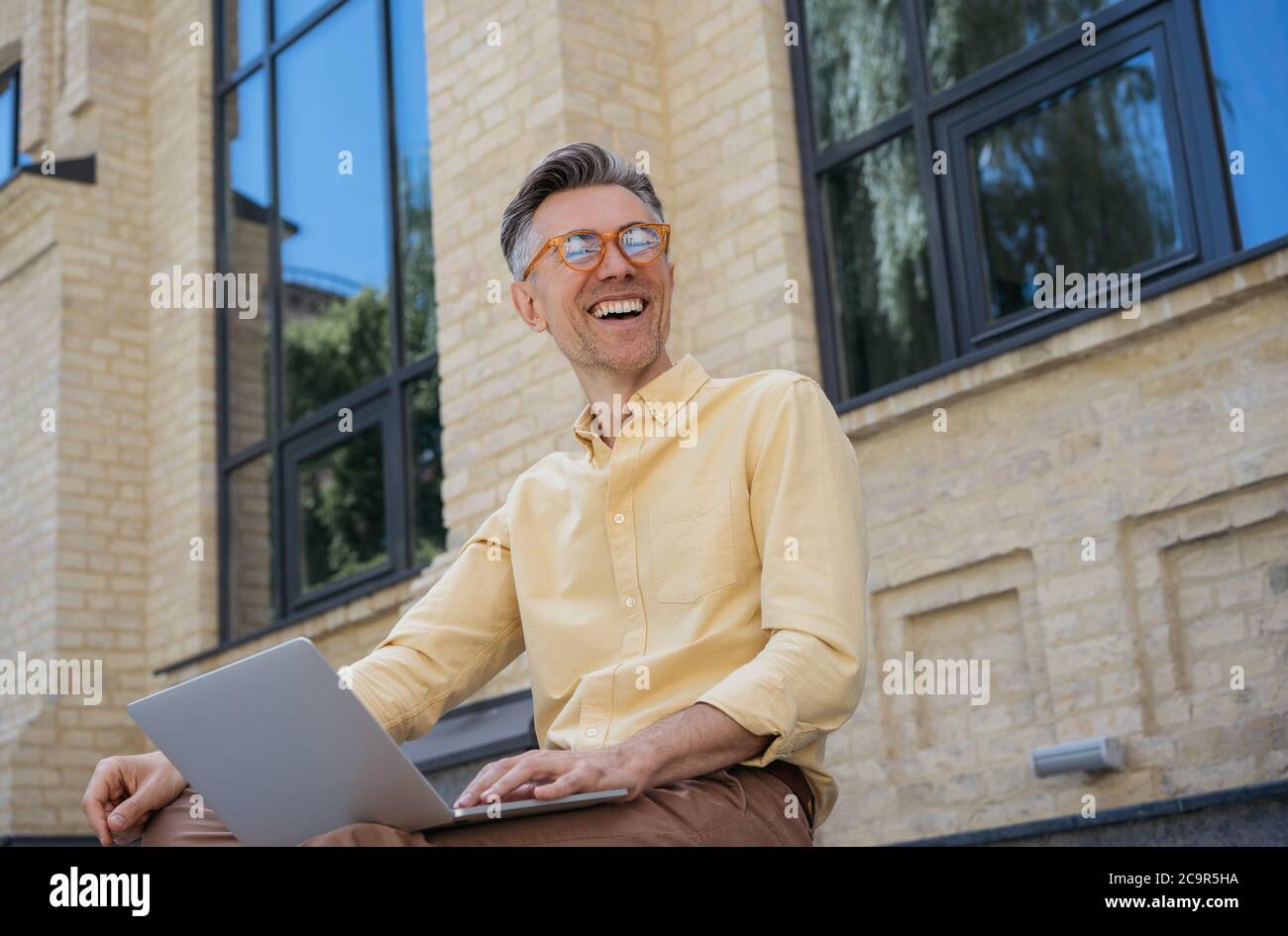 Laughing business man High Resolution Stock Photography and Images - Alamy