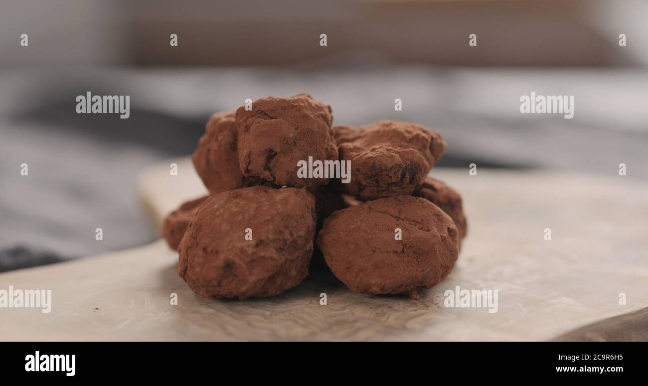 handmade chocolate truffles on a wood board Stock Photo - Alamy