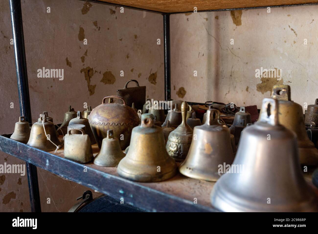 Collection of copper sheep bells in a shepherd home in rural Hungary ...