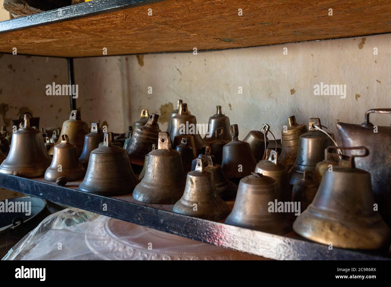 Collection of copper sheep bells in a shepherd home in rural Hungary ...