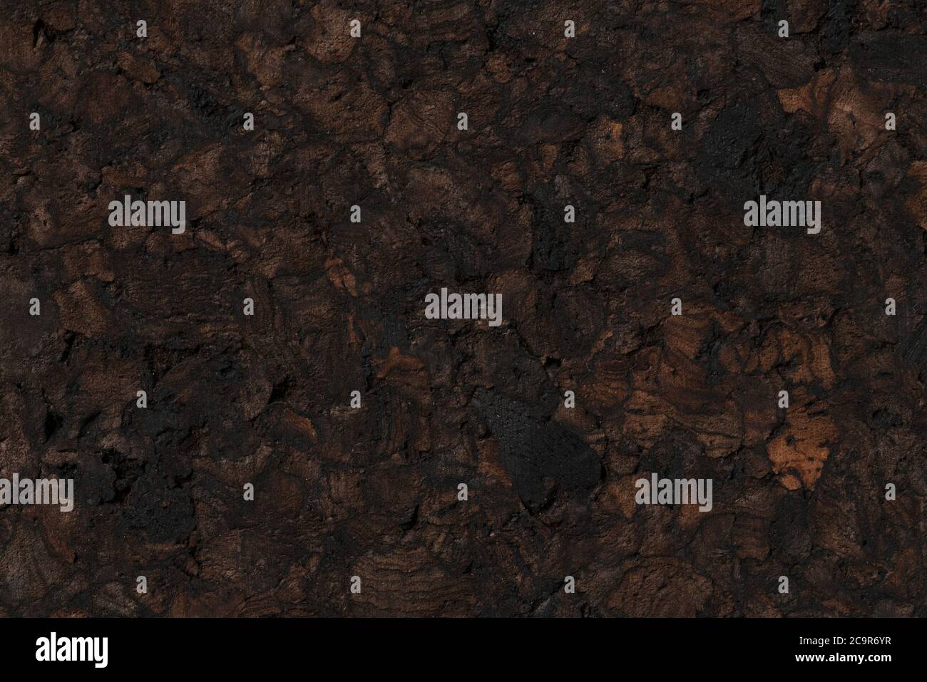 Texture of dark cork with oil finish Stock Photo - Alamy