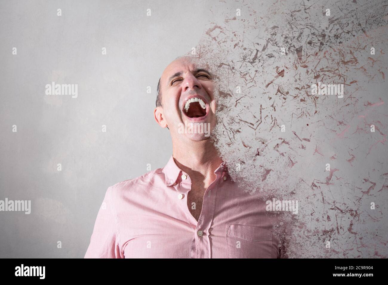 a very happy laughin man shattering Stock Photo - Alamy