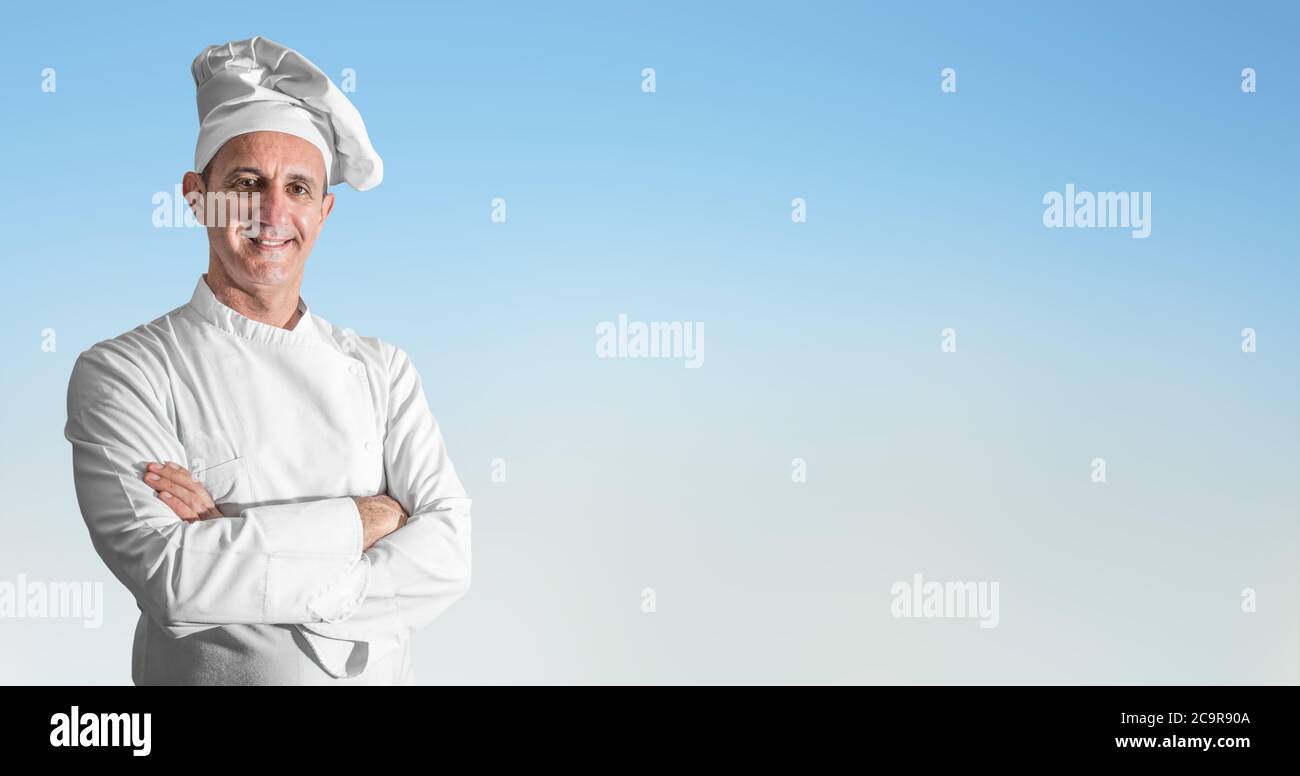 a smiling cook on ligh background Stock Photo - Alamy