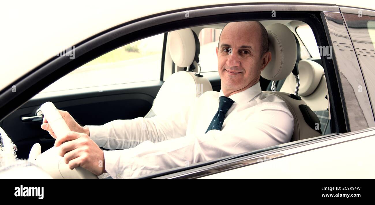 a satisfied man driving his car Stock Photo - Alamy