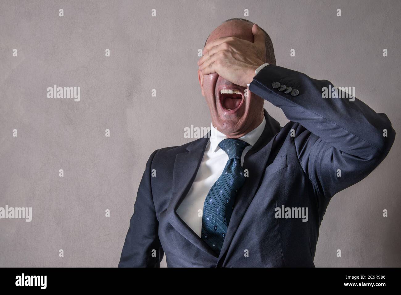 Hand in face hi-res stock photography and images - Alamy