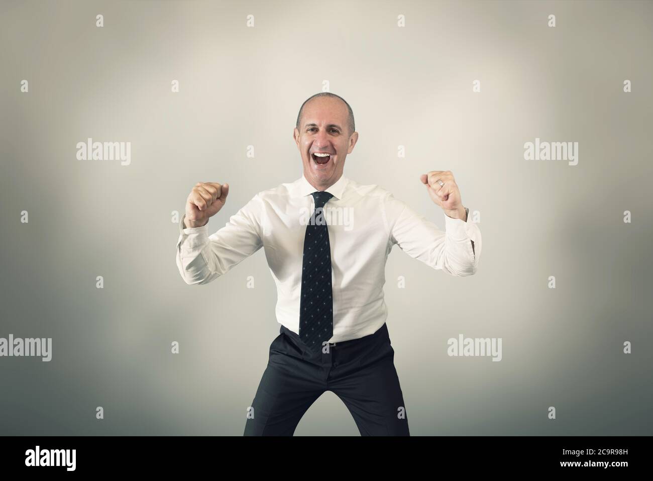 a Businessman Exulting for a success Stock Photo - Alamy