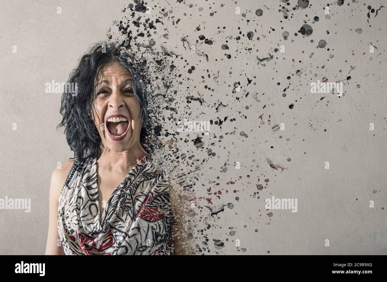 a Very stressed woman screaming dissolve Stock Photo - Alamy
