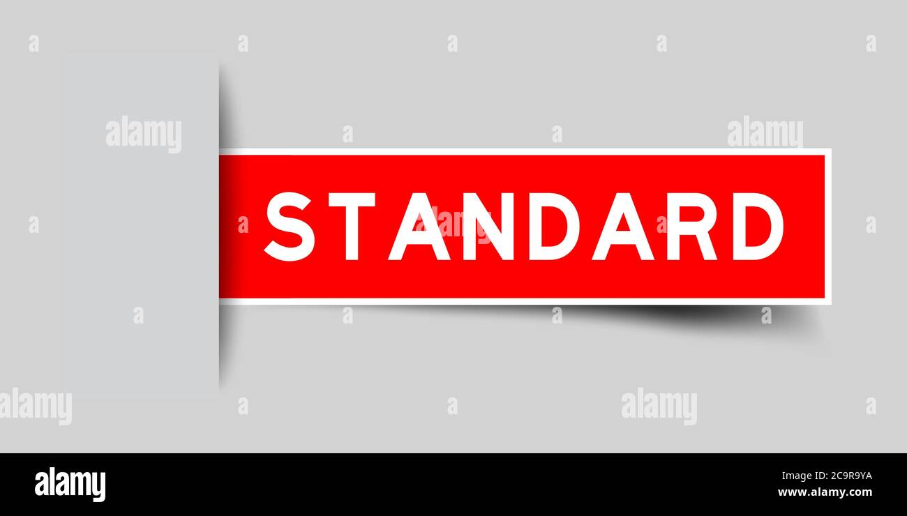 Inserted red color sticker label with word standard on gray background ...