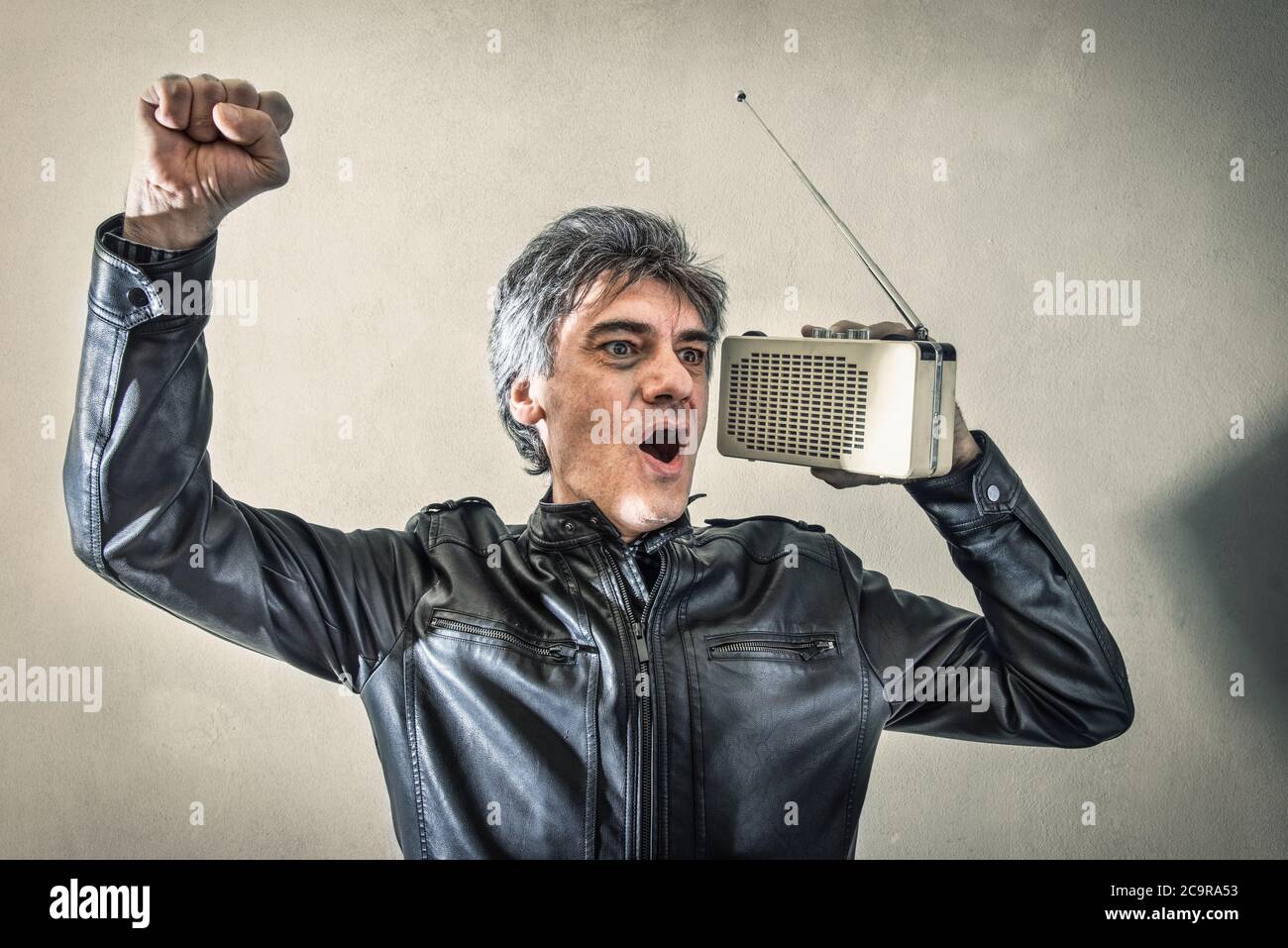 Listening to radio hi-res stock photography and images - Alamy