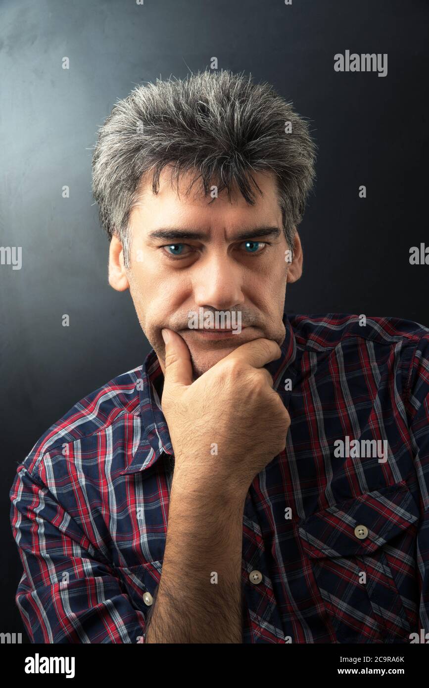 a man with serious look Stock Photo - Alamy