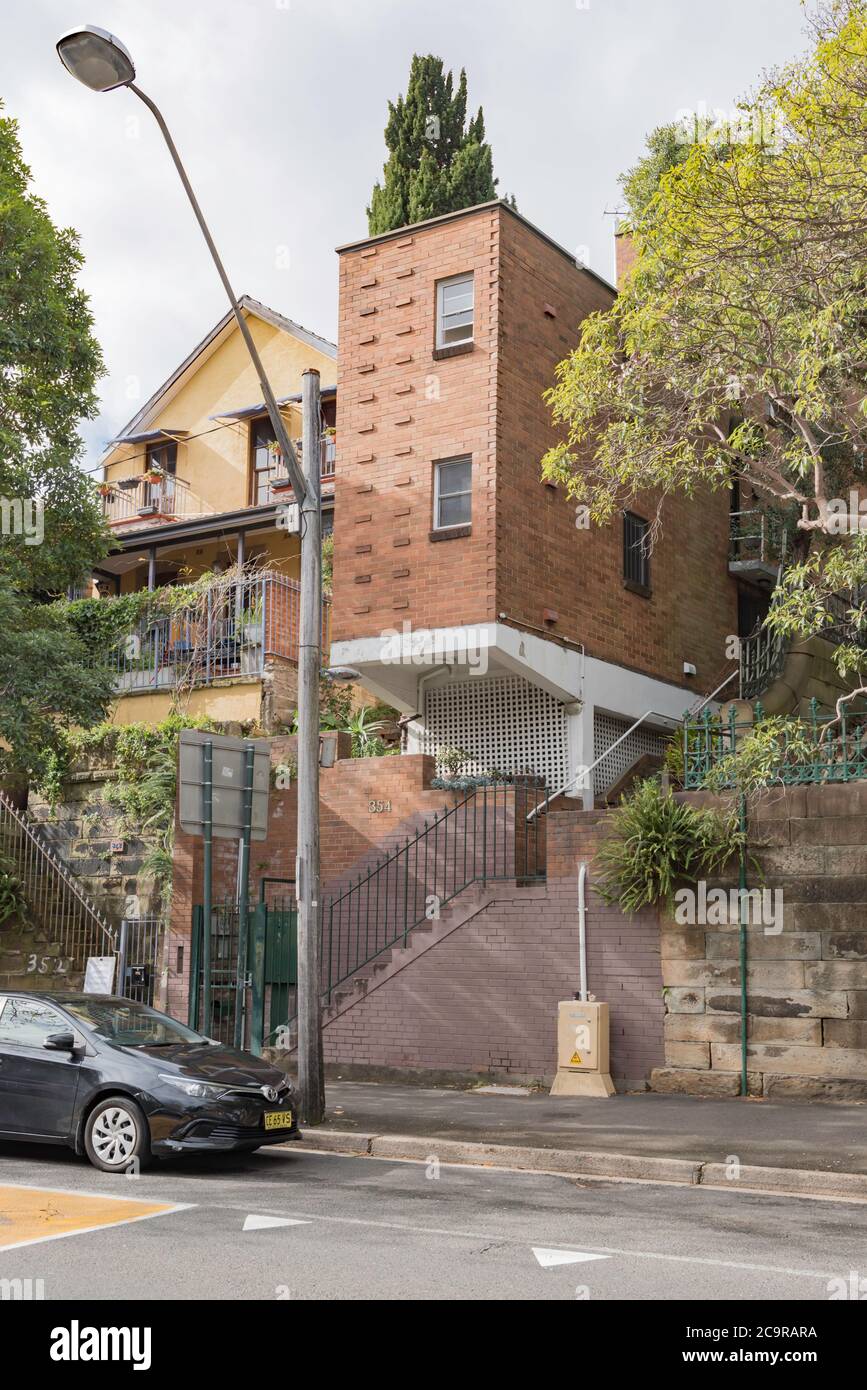 A strange narrow set of apartments built to fit the shape of the block ...