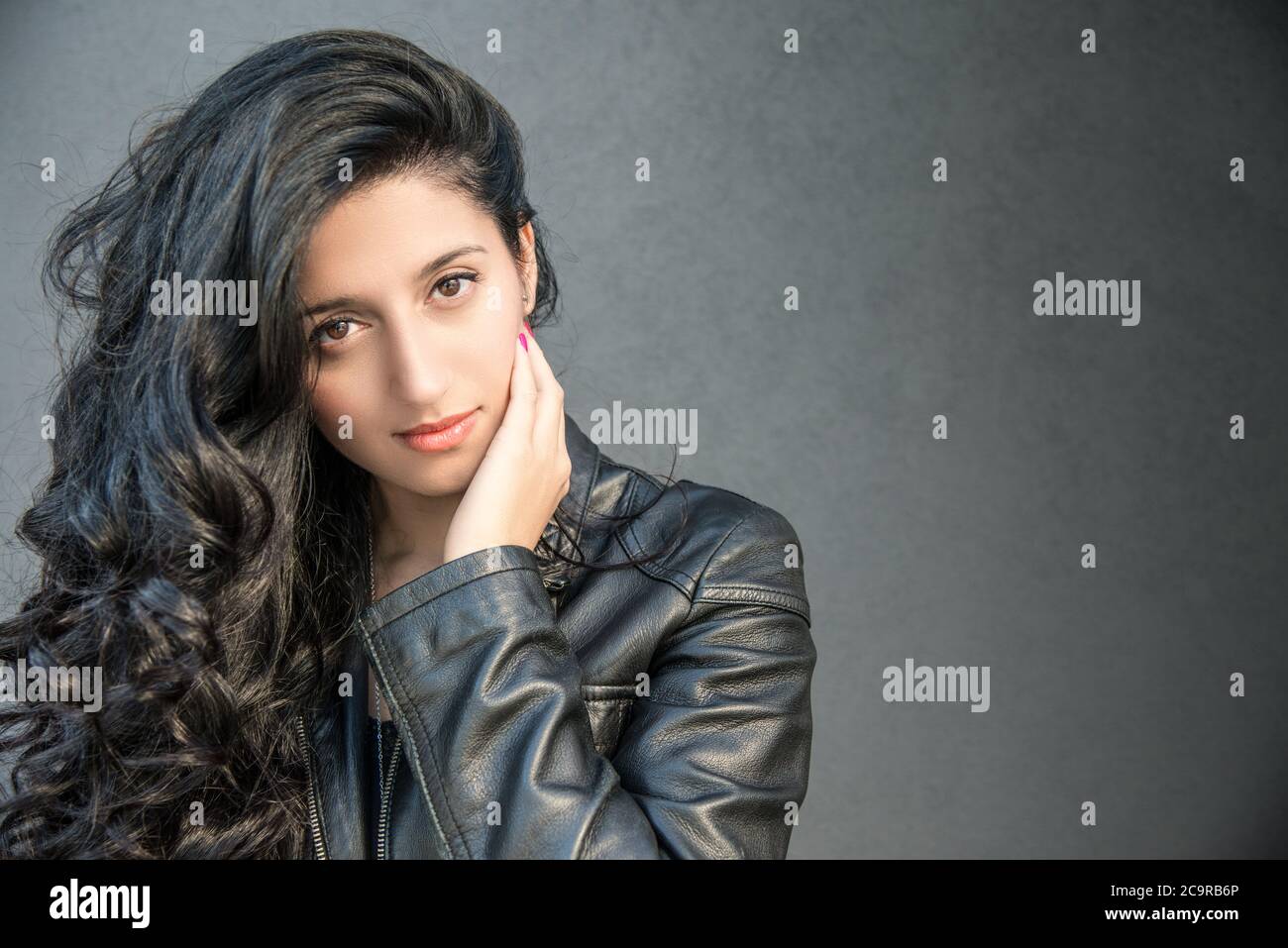 beautiful brunette girl with intense look Stock Photo - Alamy