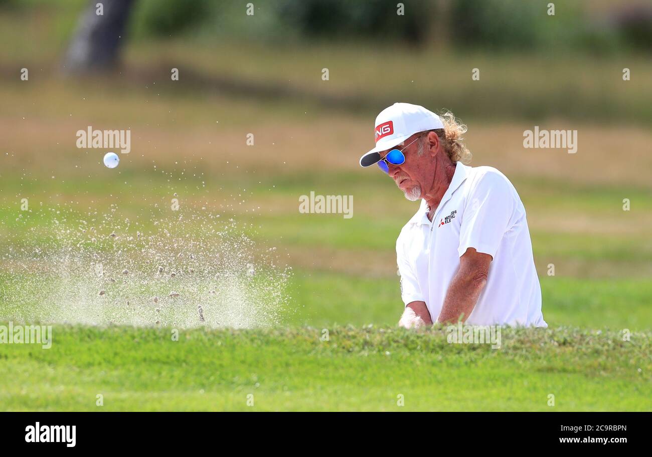 Spain's Miguel Angel Jimenez chips out of a bunker on the 7th during ...