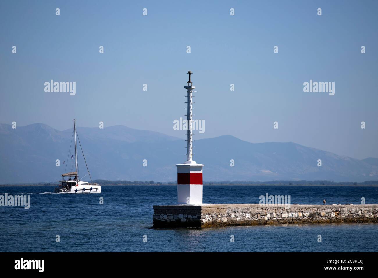 Greek specific - Sea mark with boat and flying seagulls in the Aegean ...