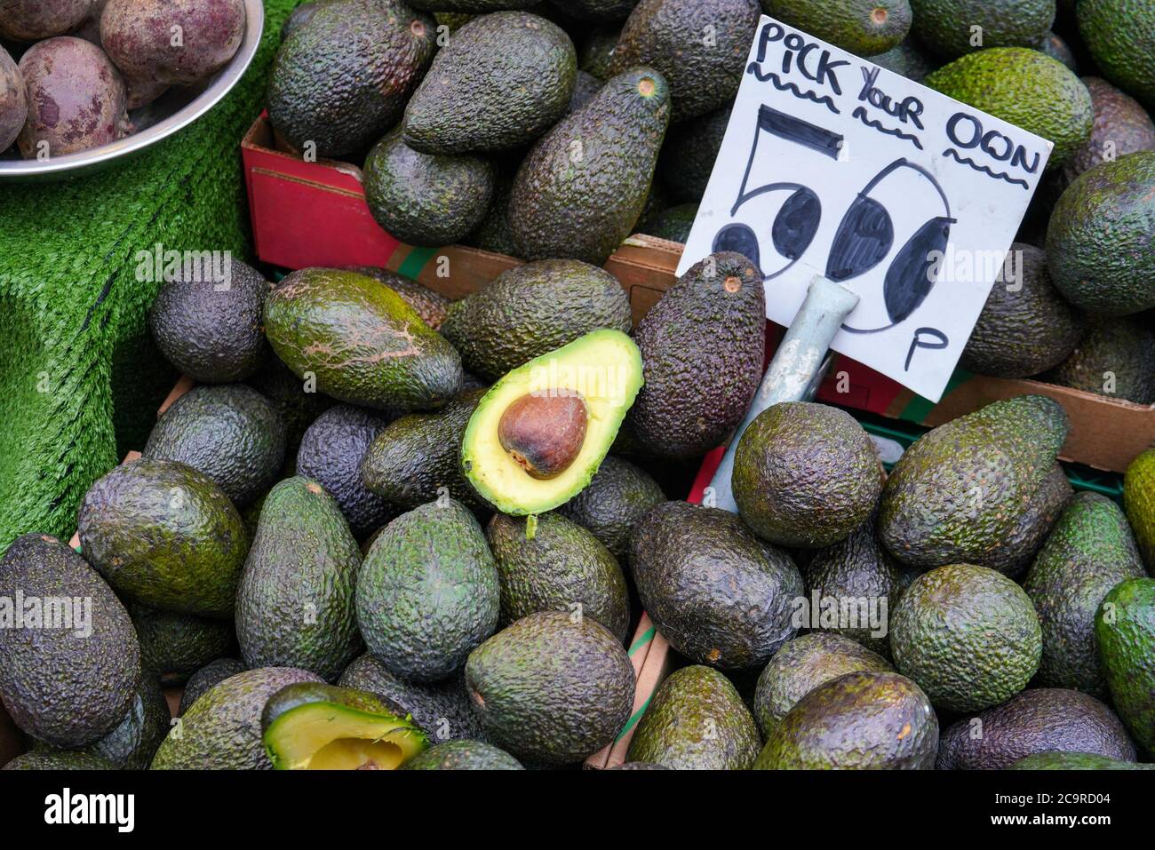 Avocados displayed on food market at Lewisham, London Stock Photo - Alamy