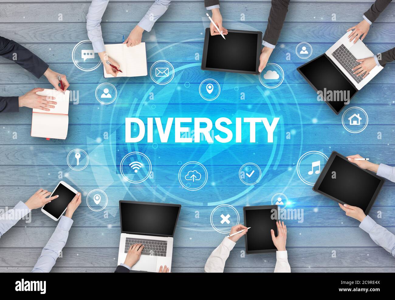 Group of people having a meeting with DIVERSITY insciption, social ...