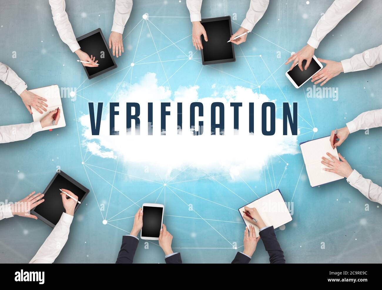 Group of people having a meeting with VERIFICATION insciption, web ...