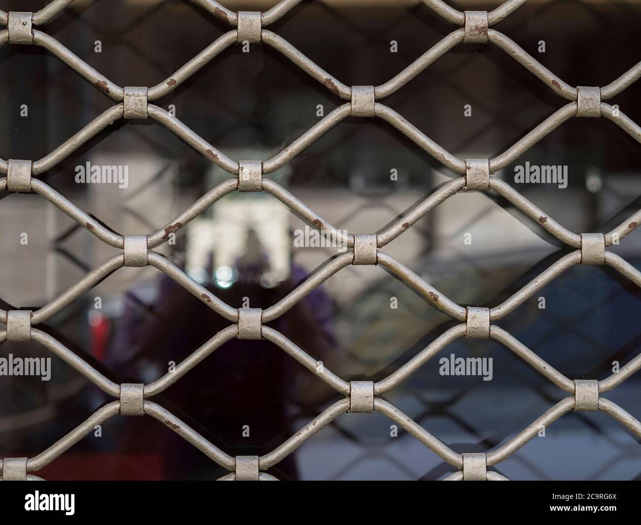 classic silver iron shop window lattice with blurred reflection Stock ...