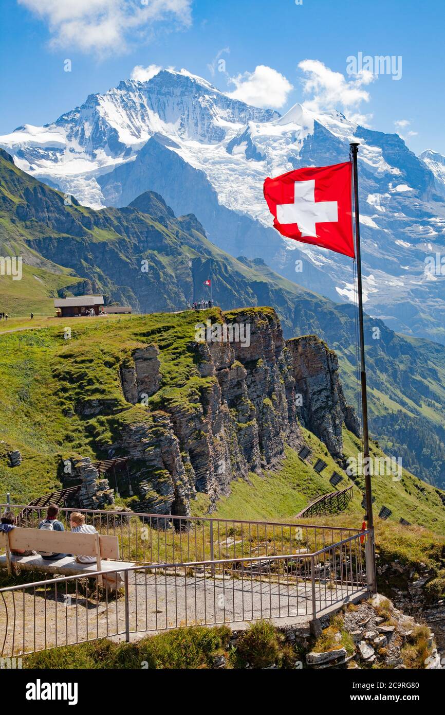 Swiss flag on the top of Mannlichen (Jungfrau region, Bern, Switzerland ...