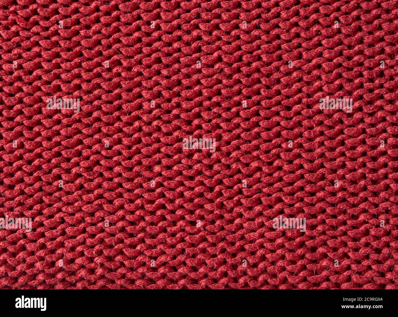 red wool knitted fabric texture abstract background Stock Photo - Alamy