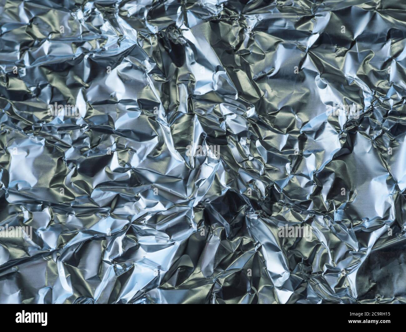 close up crumpled aluminium tinfoil silver background Stock Photo - Alamy