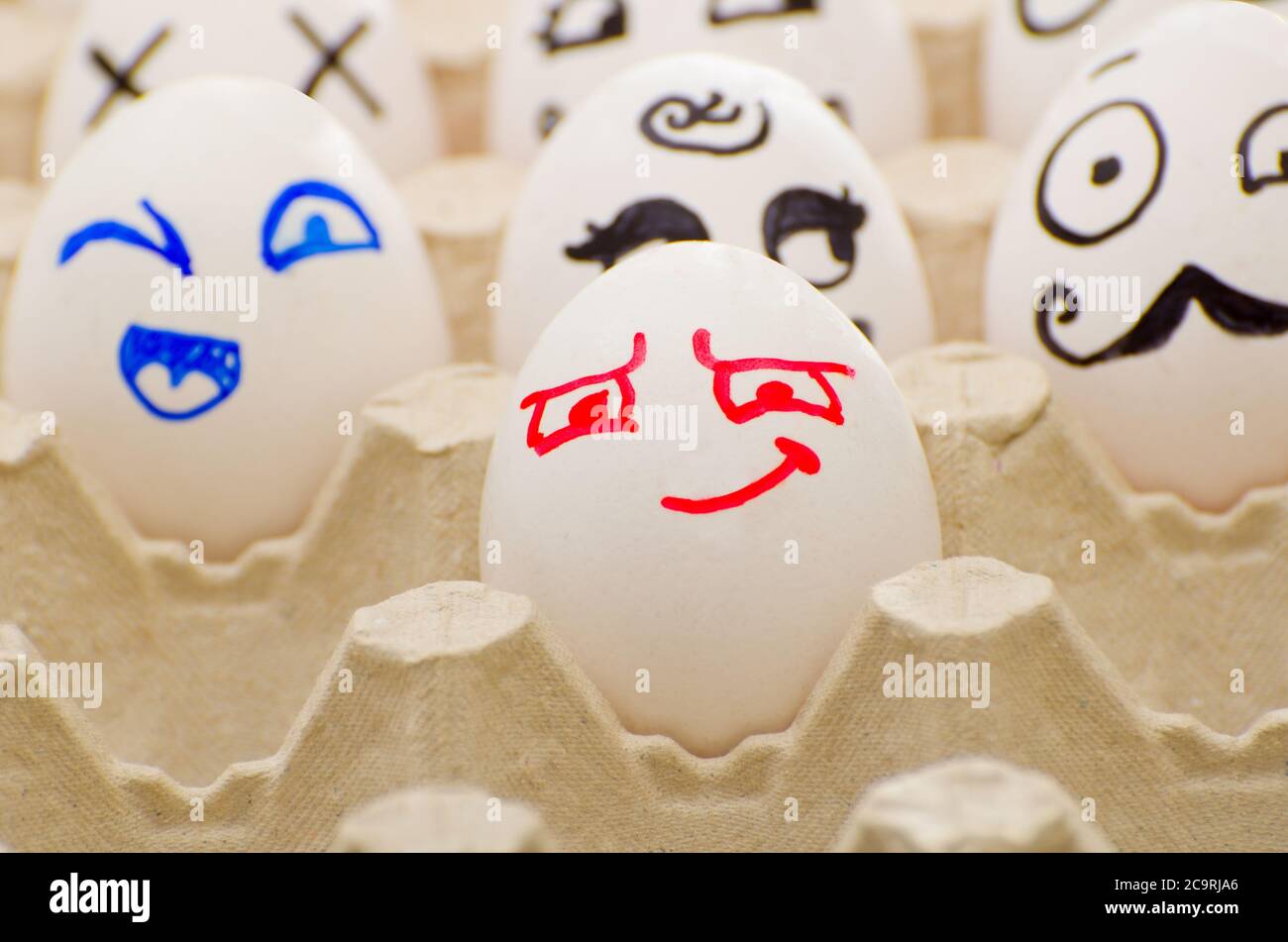 Painted eggs in tray, cunning, joyful, Hercule Poirot Stock Photo - Alamy