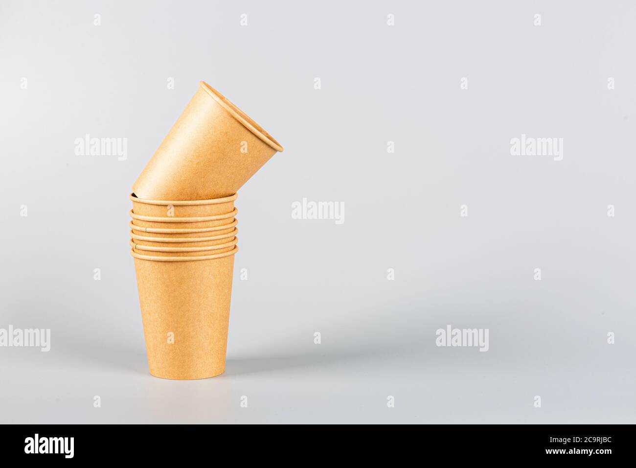 eco natural paper cups on gray background. sustainable lifestyle ...