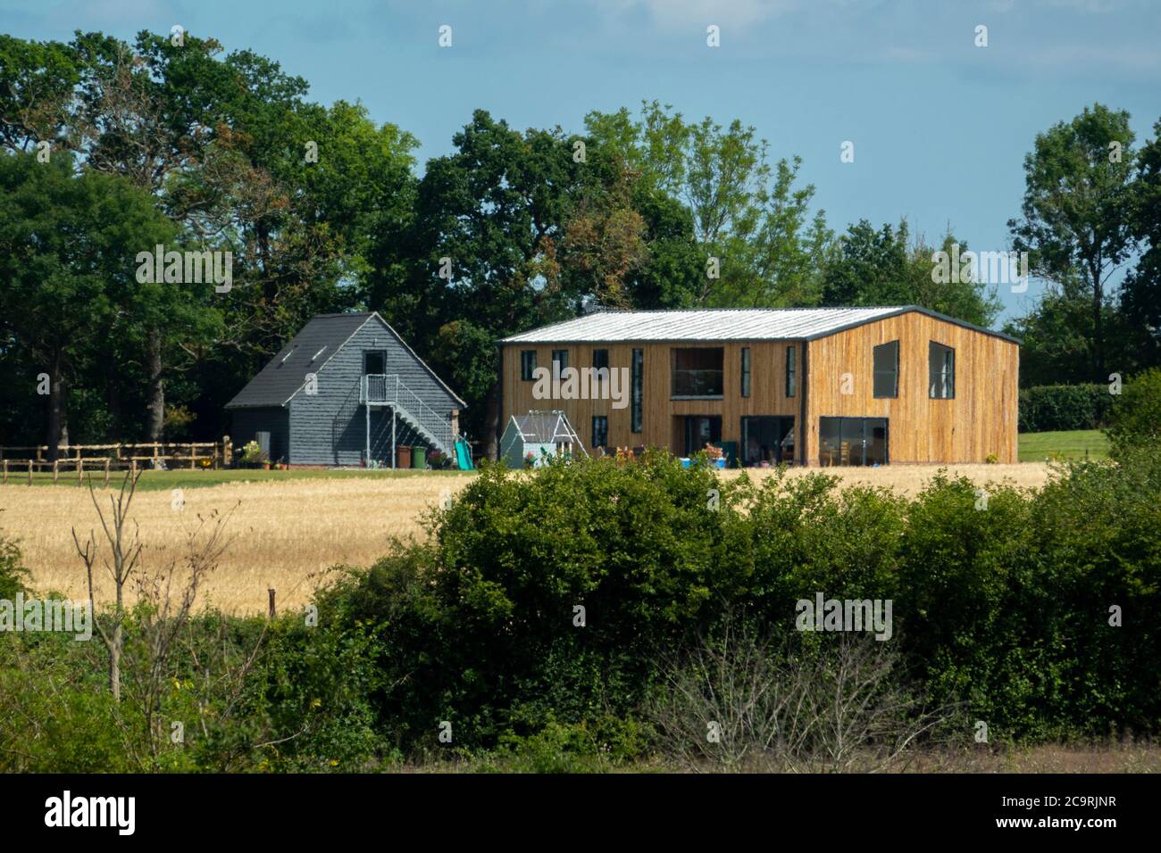 Modern house home on farm farmland Stock Photo - Alamy