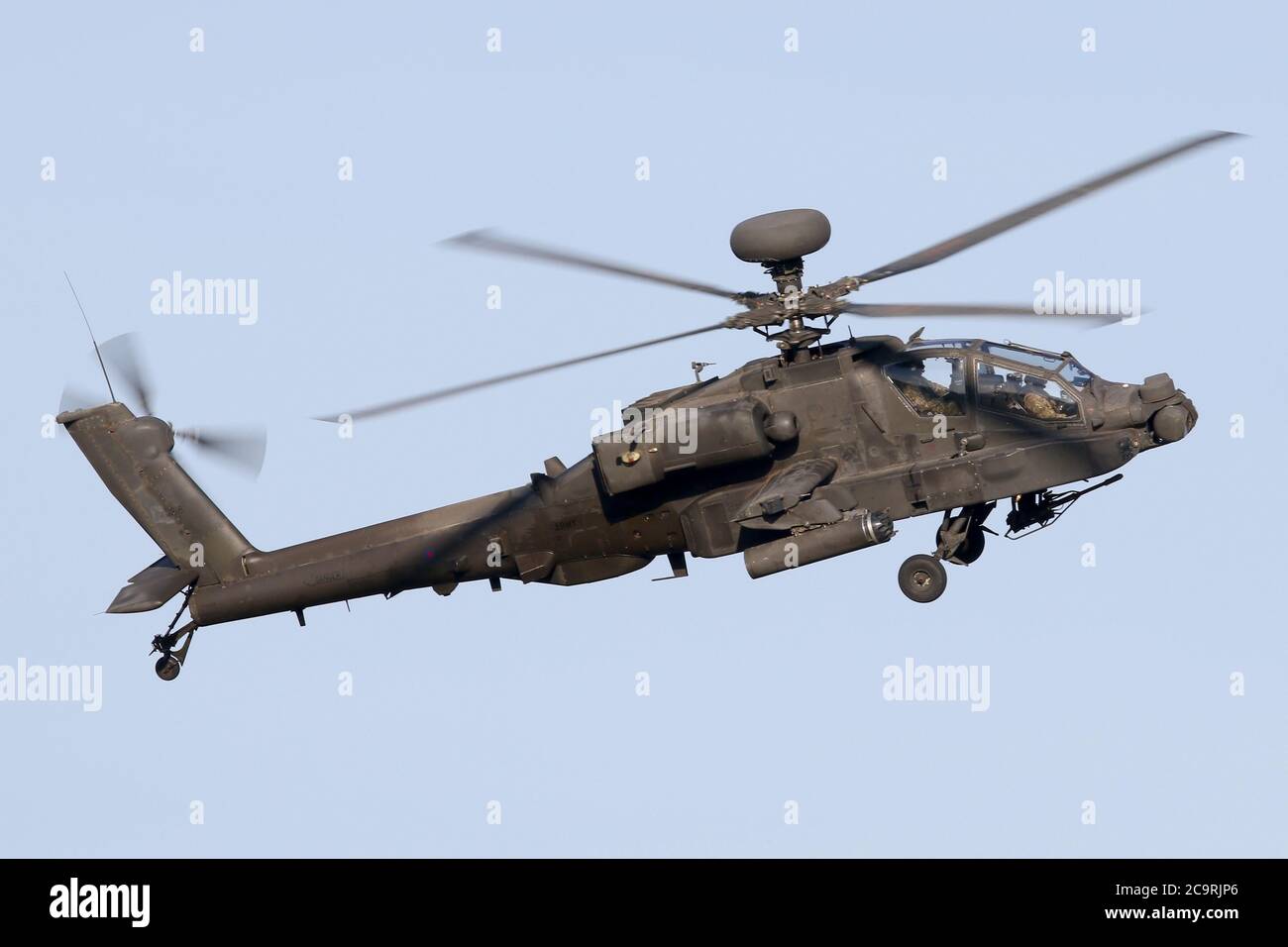 Army Air Corps Apache AH1 attack helicopter turning overhead the ...