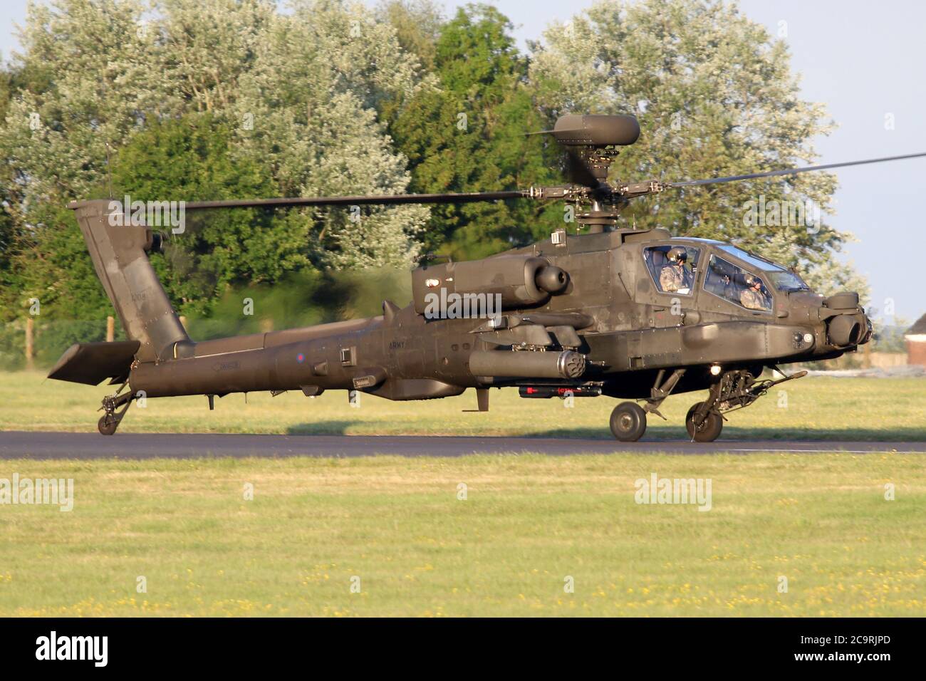 Army Air Corps Apache AH1 attack helicopter taxing on the runway at ...