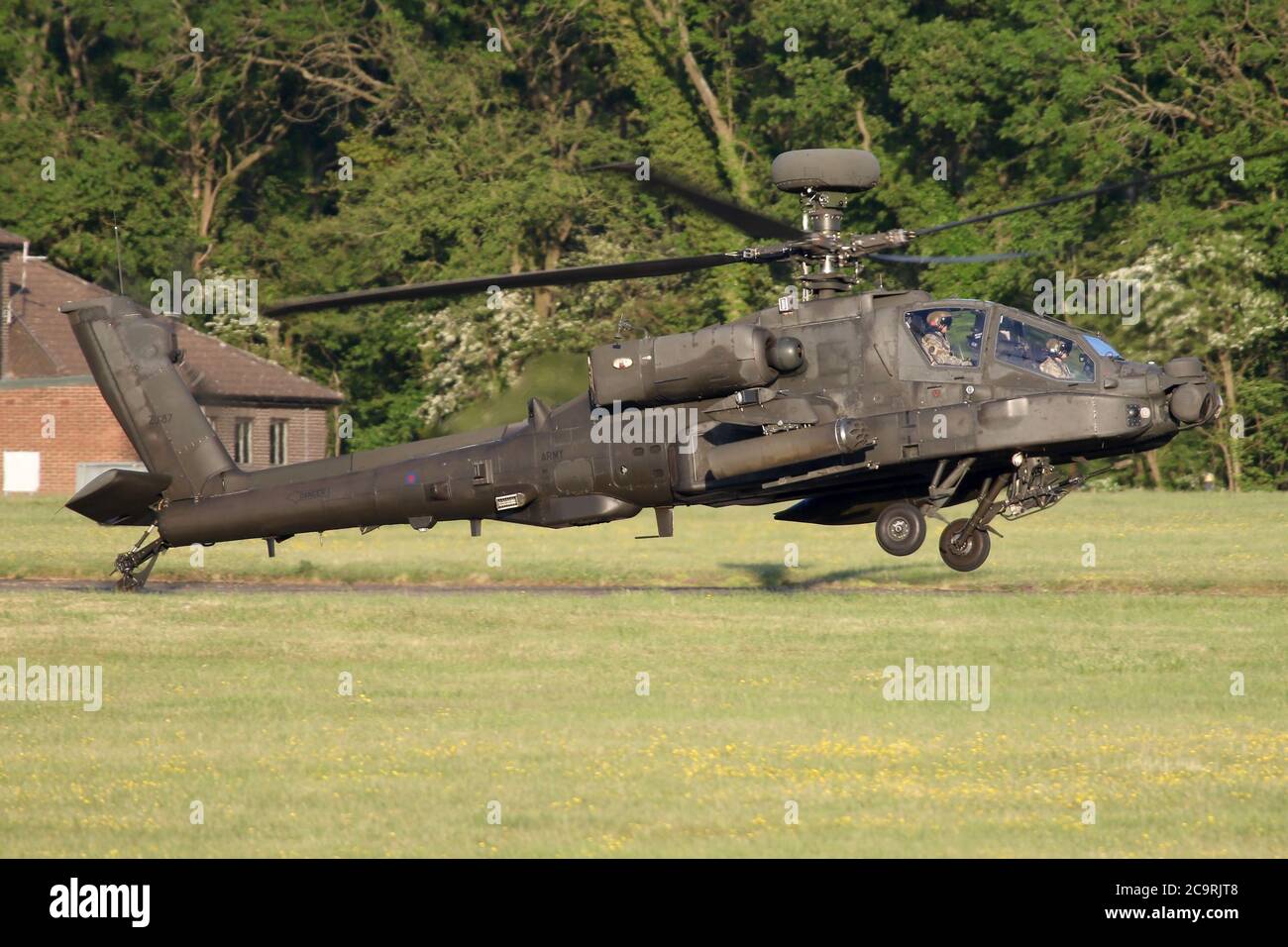 Army Air Corps Apache AH1 attack helicopter landing on the runway at ...