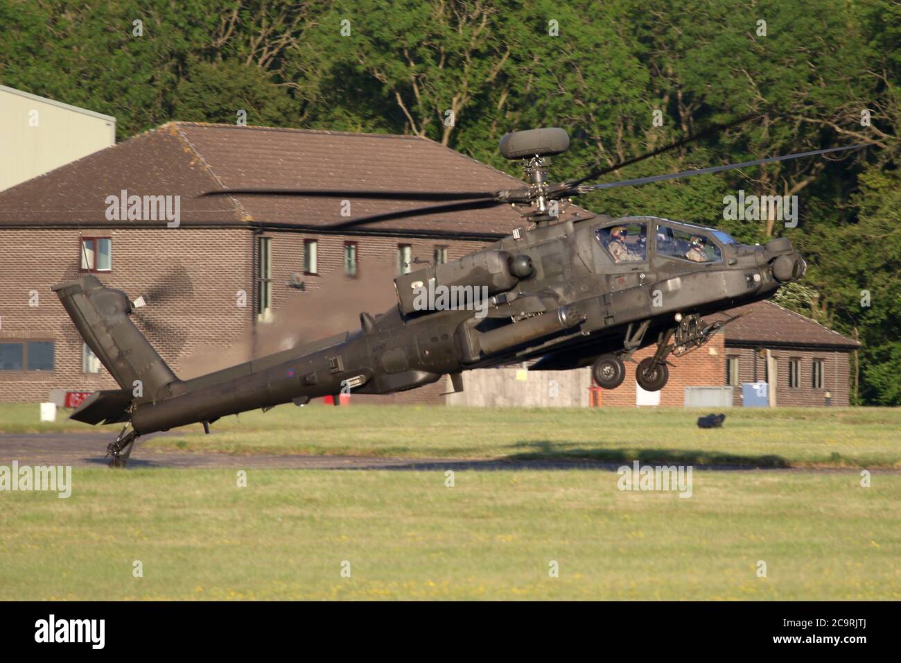 Army Air Corps Apache AH1 attack helicopter landing on the runway at ...