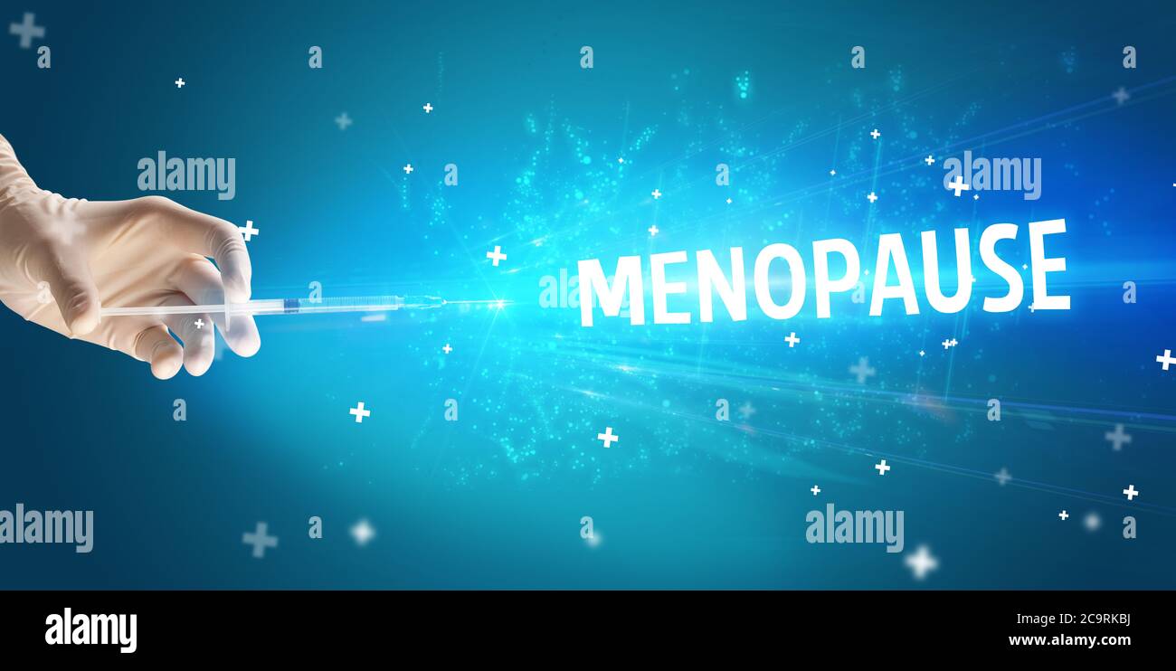 Syringe, medical injection in hand with MENOPAUSE inscription, medical ...