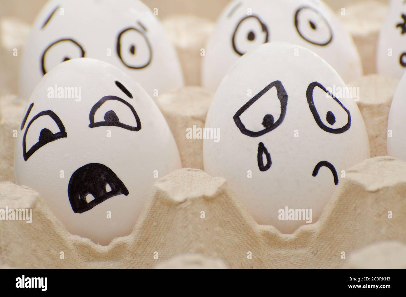Eggs with the drawn emotions, frightened and crying face Stock Photo ...