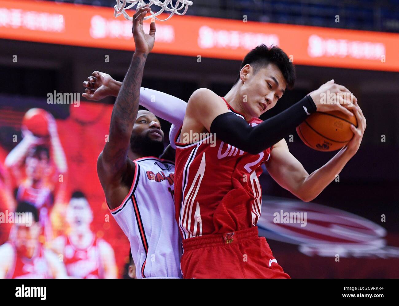 Qingdao, China's Shandong Province. 2nd Aug, 2020. Wang Ruize (R) of ...