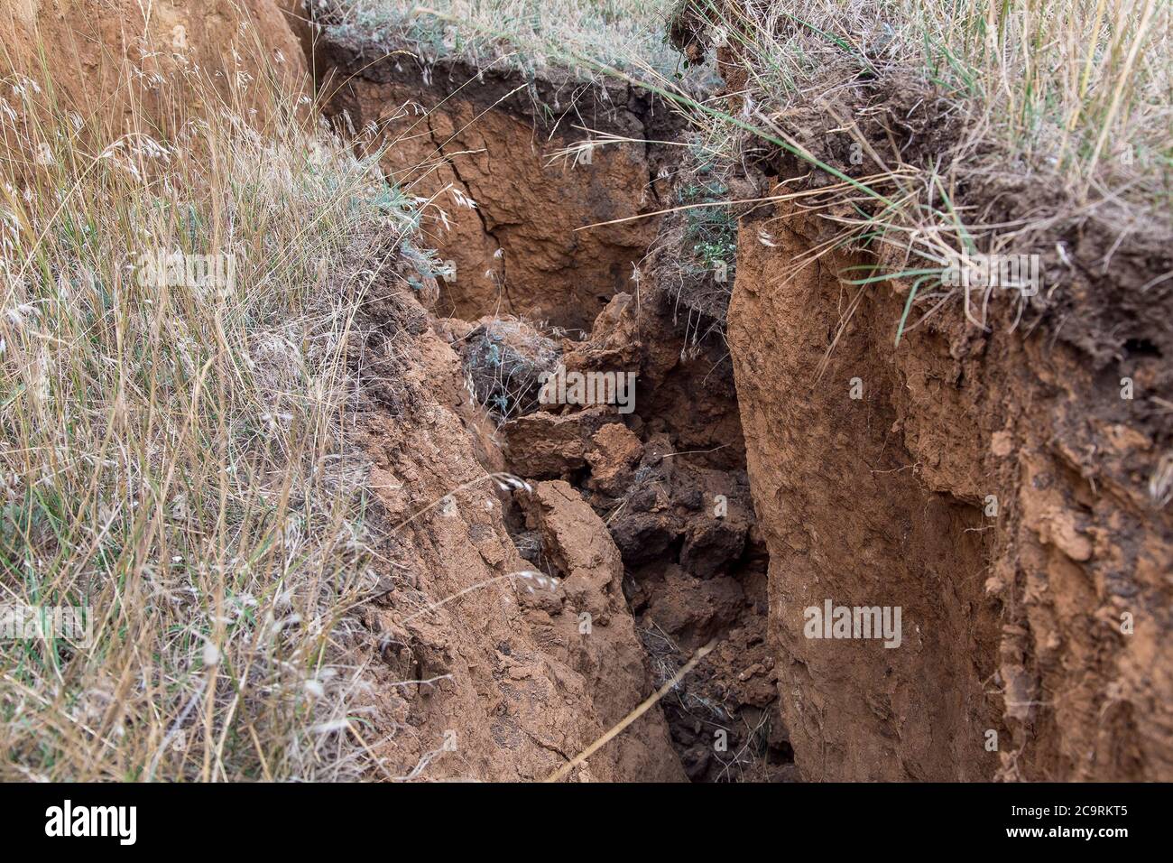 ecological disaster landslide of clay soil after an earthquake, a close ...