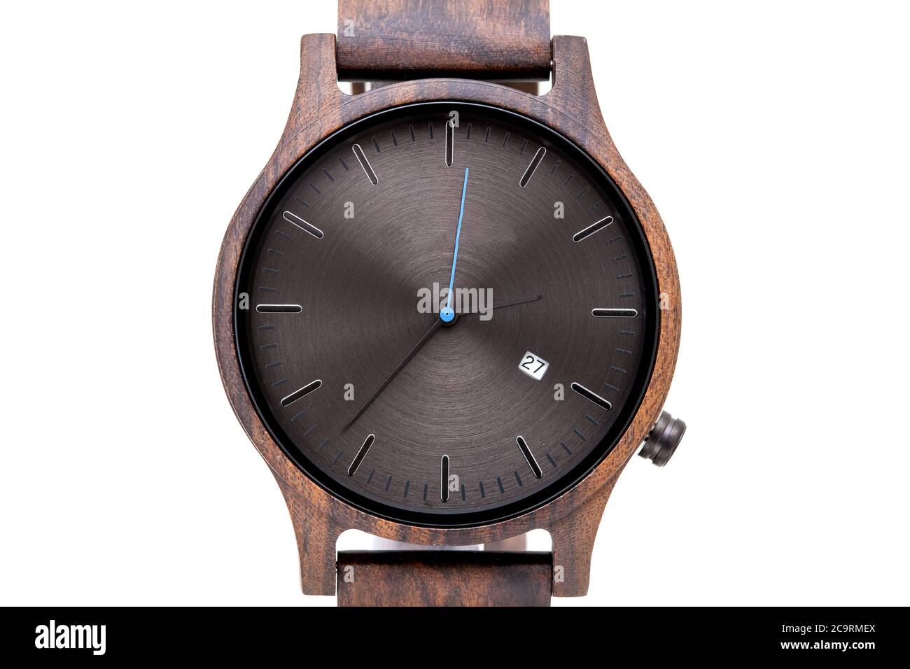 wooden wrist watch with aluminum dial and arrows, close-up front ...