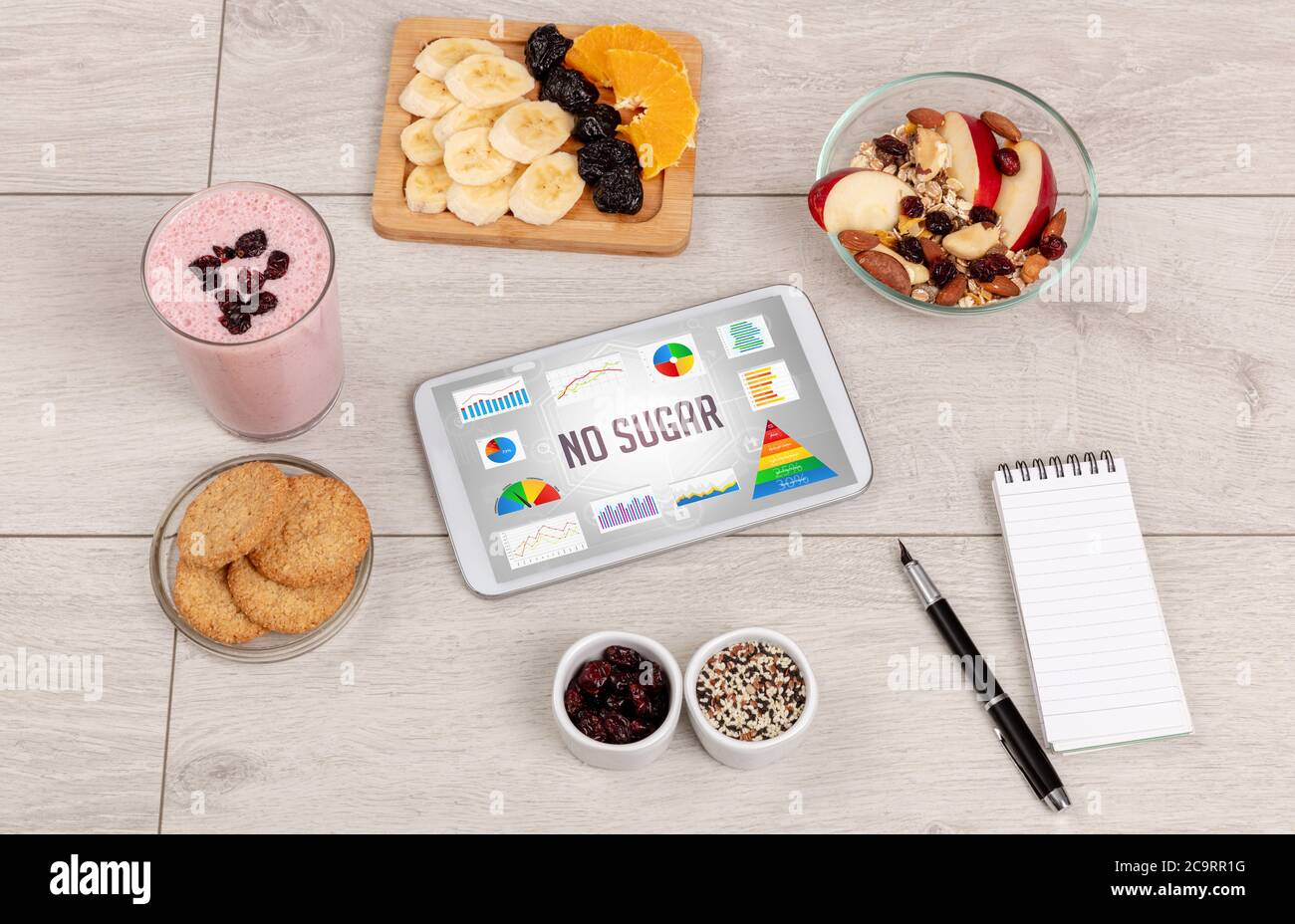 Organic food and tablet pc showing NO SUGAR inscription, healthy ...