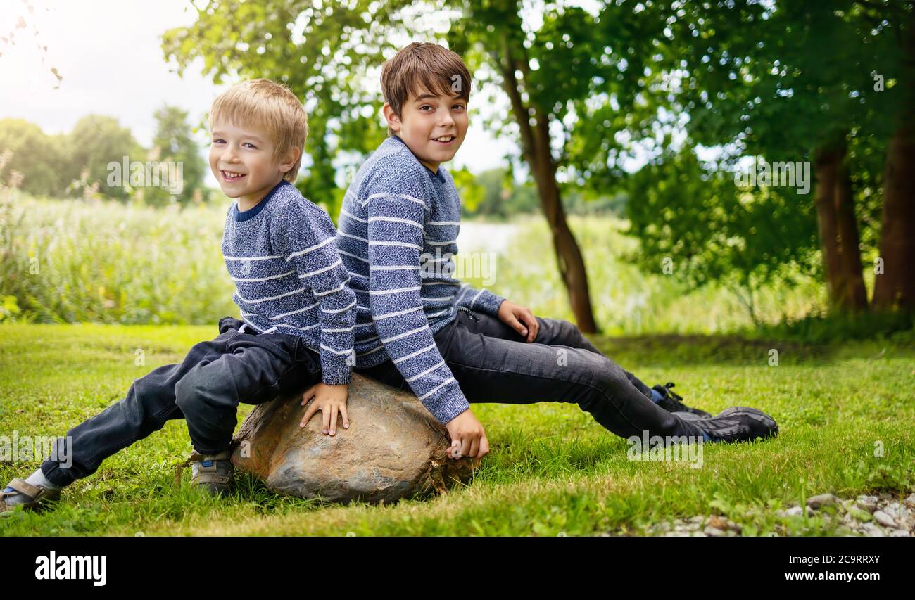 Two brothers hugging hi-res stock photography and images - Alamy