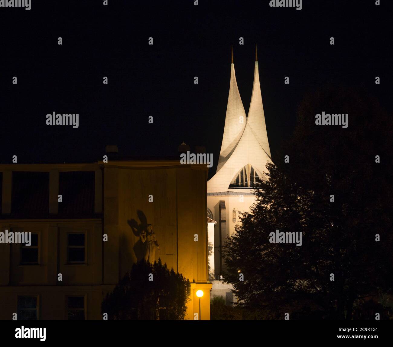night view of illuminated Towers of modern roof with steeples of gothic ...