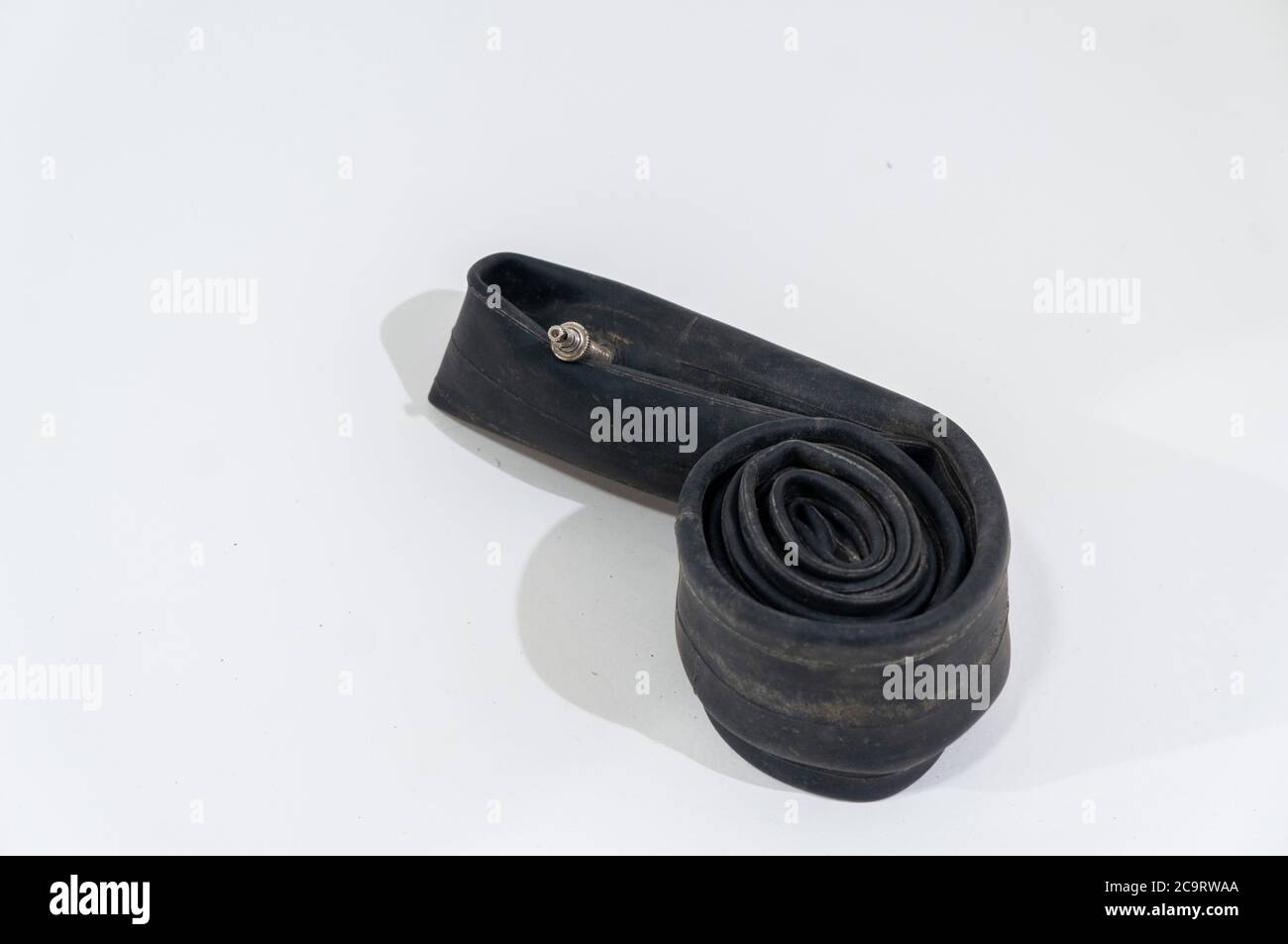 Old deflated Rubber Tire Tube for Bicycling with valve Stock Photo - Alamy