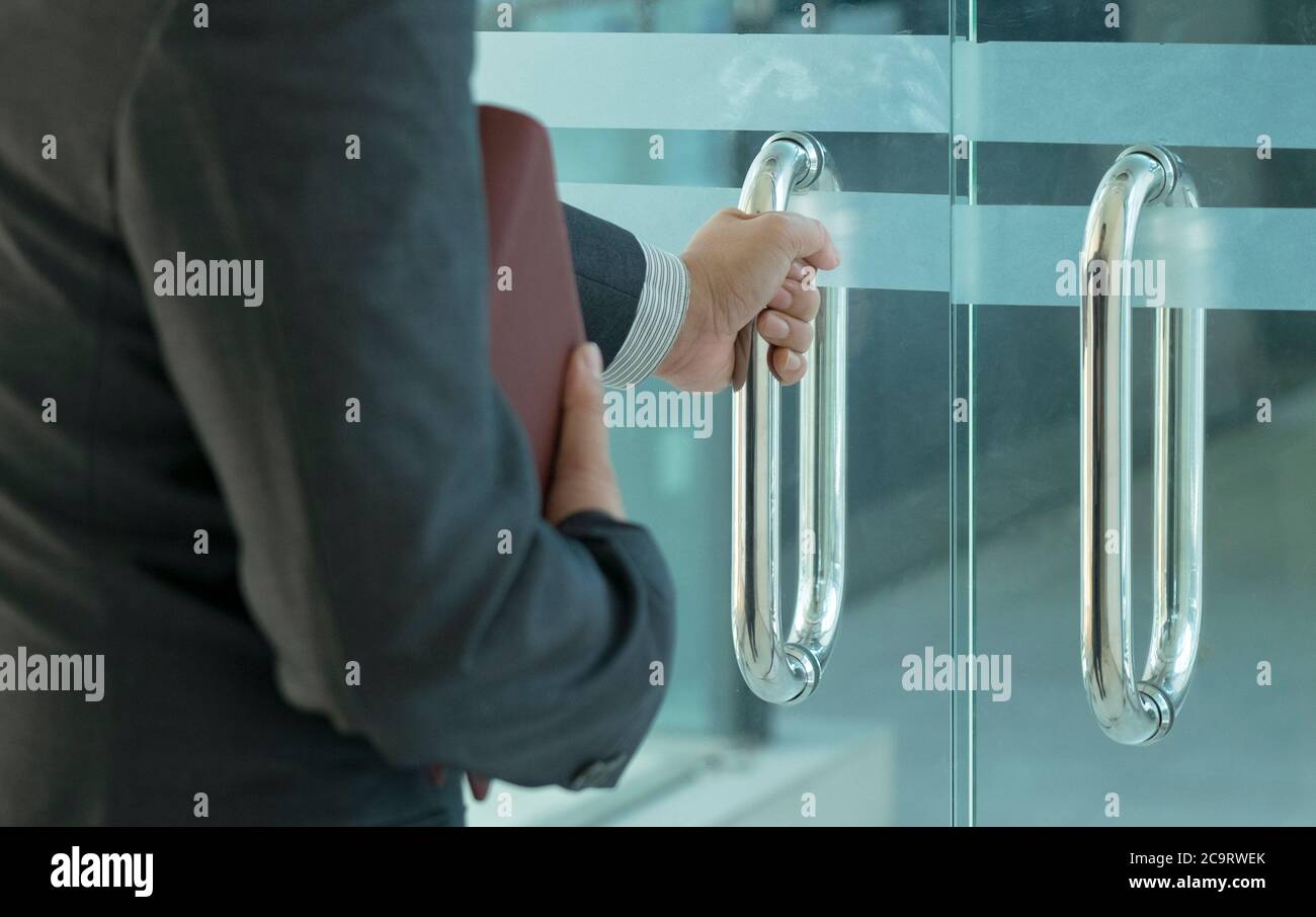 Man pushing a door with his body hi-res stock photography and images ...